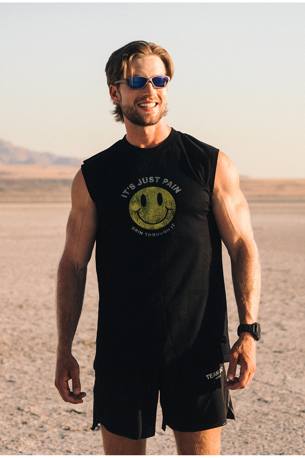 GRIN THROUGH IT MUSCLE TANK